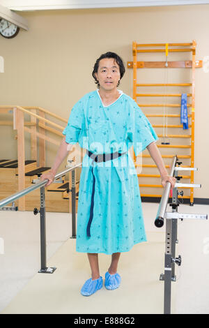 Rehabilitation equipment room with parallel bars and exercise balls for ...