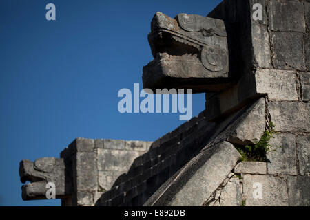 Two heads representing Kukulkan, the Feathered Serpent god, decorate a ...
