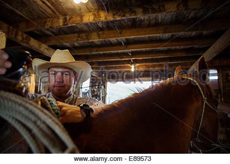 Cowboy on his horse on a ranch in northeastern Wyoming Stock Photo - Alamy