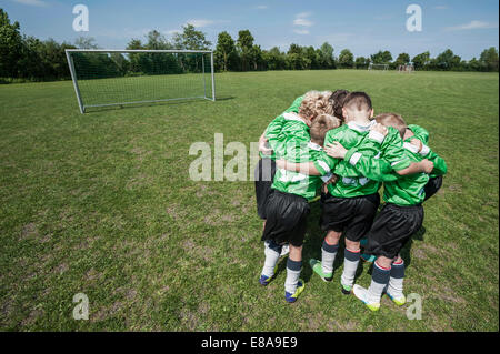 Boys Sport Team Huddle. Kids of Soccer Team Gathered Before the ...