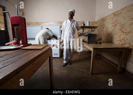 African butcher poses in his meat processing room, Kigali, Rwanda Stock ...