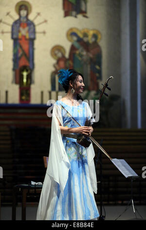 Frankfurt, Germany. 3rd Oct, 2014. Chinese musician Ma Xiaohui reacts ...