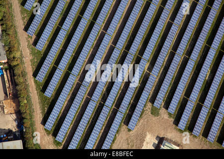 Aerial view of solar panels green energy power plant located on hill ...