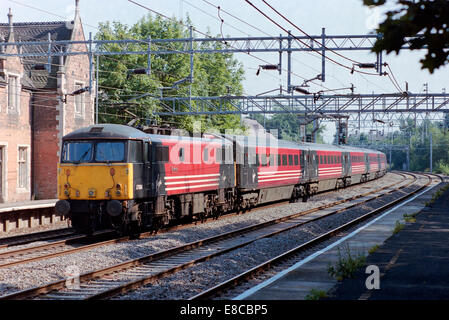 A class 87 electric locomotive number 87002 working a Virgin West Coast ...