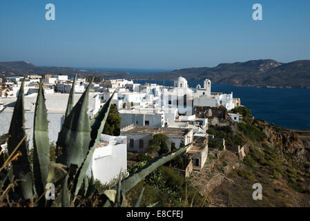 View of Plaka village with traditional Greek church. Milos island ...