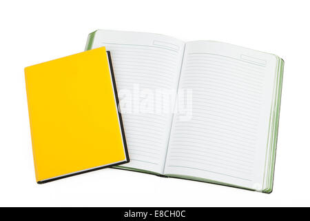 Yellow notebook isolated on a white background Stock Photo - Alamy