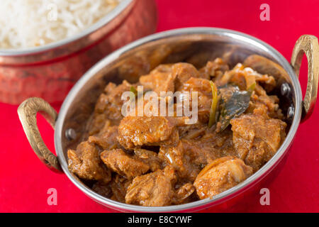chicken malabar curry in a traditional kadai or karahi bowl, with ...