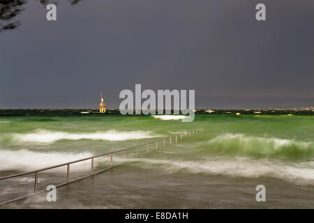 Thunderstorm and high waves at the Horn outdoor pool, rainbow over Lake ...