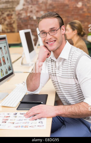 Photo editors using computers in office Stock Photo - Alamy