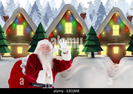Composite image of santa claus waving Stock Photo - Alamy