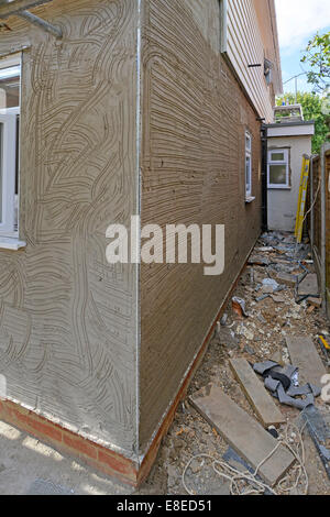 Cement & sand rendering scratch coat on house wall showing corner angle ...