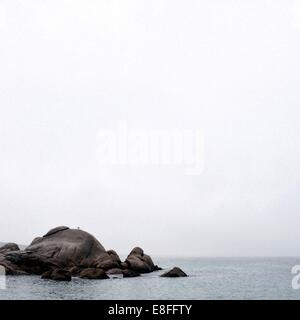 Rocks in the sea Stock Photo - Alamy