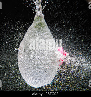 Water balloon bursting Stock Photo - Alamy