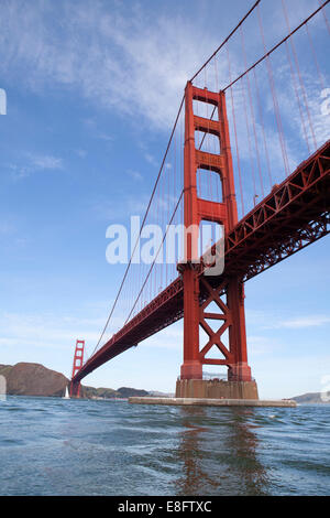 Majestic low angle Golden Gate Bridge tower reaching to the sky Stock ...