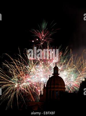 Low angle view of colorful fireworks in the sky during the night - a ...