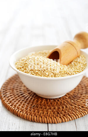 Organic quinoa seeds in wooden bowl - Chenopodium quinoa Stock Photo ...