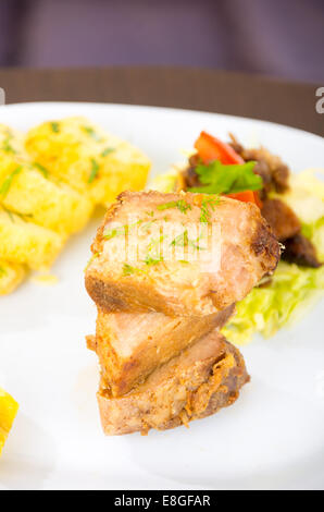 fritada fried pork traditional ecuadorian food Stock Photo - Alamy