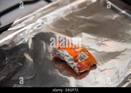 Shrinking a crisp packet in the oven, childhood craze from the 1980s ...