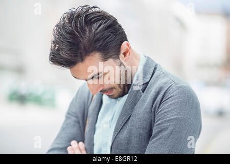 Businessman looking sad Stock Photo - Alamy