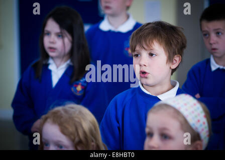 Primary school children Singing and assembly at UK Primary school Stock ...