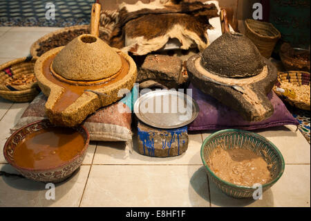 Argan oil extraction by traditional stone handmill mill Stock Photo - Alamy