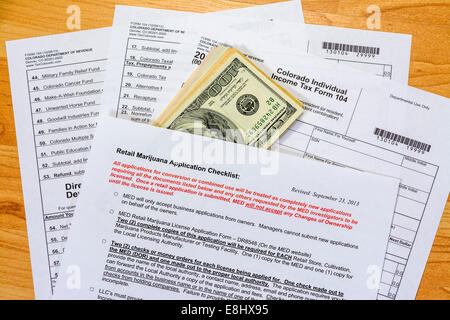 Marijuana and Money Stock Photo - Alamy