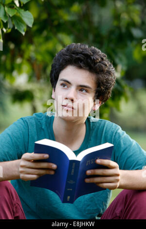 Teenager reading her Bible Stock Photo - Alamy