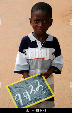 boy holding slate Stock Photo - Alamy
