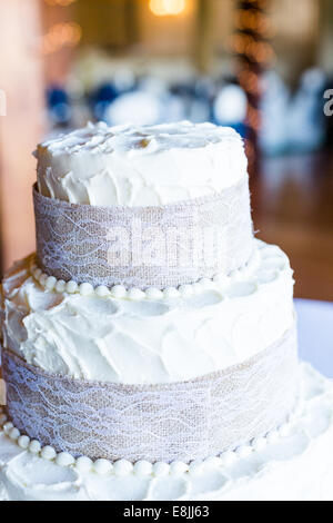 Three stack simple wedding cake in banquet hall Stock Photo - Alamy