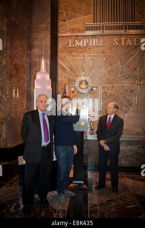 Robert Baylis, President of the Board, Rubin Museum of Art, speaks to ...