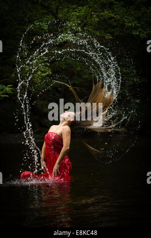 Fibonacci sequence: A blonde haired woman girl wearing a deep red frock ...