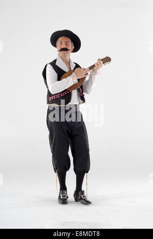 Musician with mandolin in traditional dress, Italy Stock Photo - Alamy