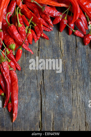 Red chili pepper on the table Stock Photo - Alamy