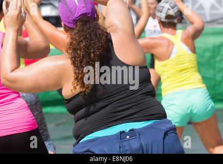 Large woman at outdoors Zumba aerobics exercise class in Spain Stock ...