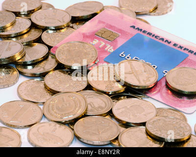 Bunch of coins with credit card - American express and mastercard Stock ...