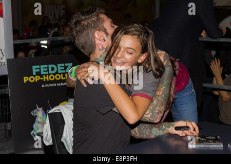 Turin, Italy. 12th October, 2014. The Italian rapper Fedez, meet his ...