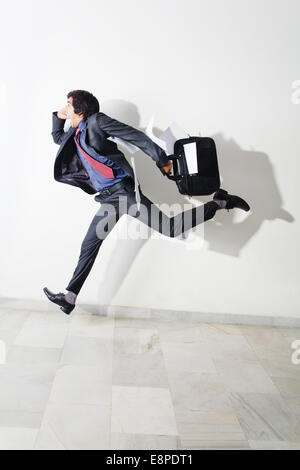 A man ties his running shoes on a running track Photo: Henrik Isaksson ...