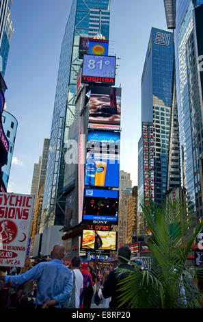 Giant digital ads amid skyscrapers in Times Square, New York City Stock ...
