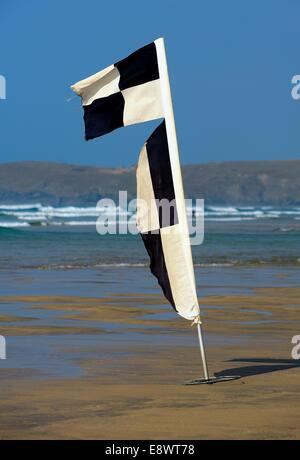Safe area Boundary Flag markers on the beach at Woolacombe Bay Beach ...