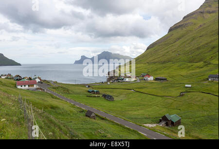 Colorful Elduvík village with roof turf covered with Funningsfjodur ...