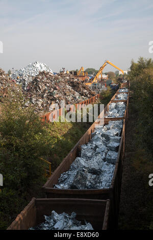 Scrap metal recycling loading train wagons with processed metals, EMR ...