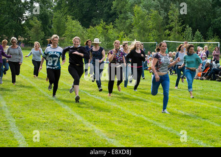 School sports day mothers parents and teachers race 2014 Stock Photo ...