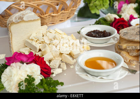 buffet table with cheese, honey and jam Stock Photo - Alamy