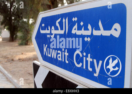 Road sign to Kuwait City, in Ahmadi, Kuwait Stock Photo - Alamy