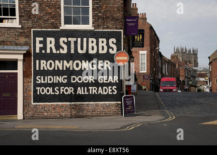 Stubbs Ironmonger sign painted on wall York UK Stock Photo - Alamy