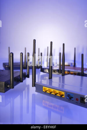 Wi fi router on the blue background Stock Photo - Alamy