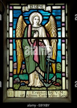 A stained glass window depicting Hope with Anchor, All Saints Church ...