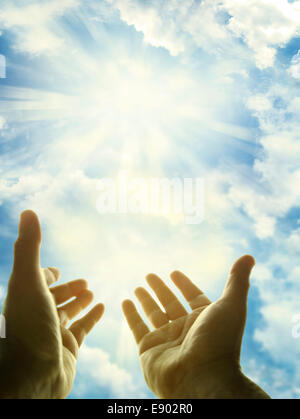 Hands reaching for the sky Stock Photo - Alamy