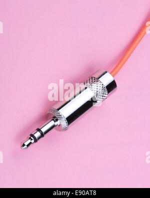 Stereo Male Plug Connector on Pink Background Stock Photo - Alamy