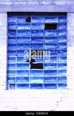 Destroyed window pane in an abandoned office building Stock Photo - Alamy